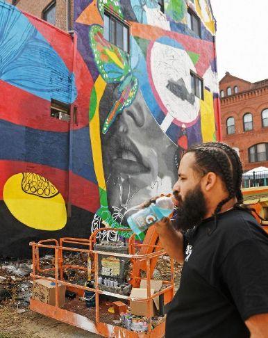 New murals brighten downtown Norwich, with more to come | The Day