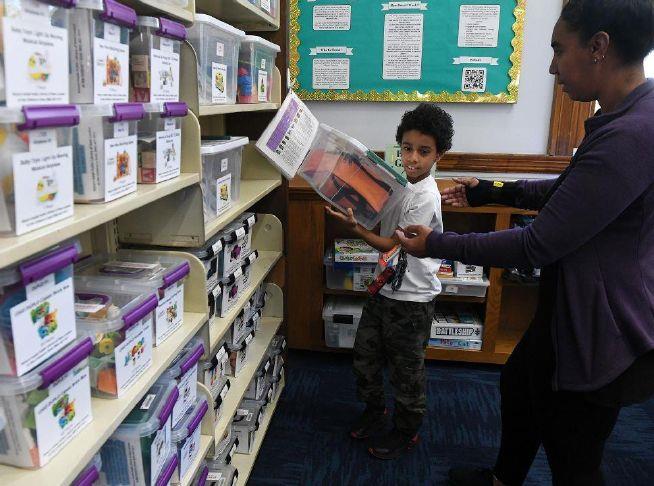 Toy library opens at New London public library | The Day