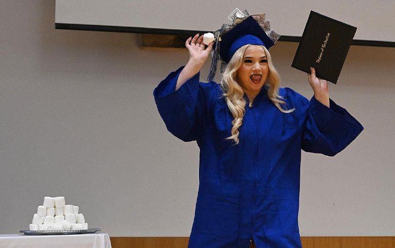 Three Rivers Middle College Magnet High School graduates 49